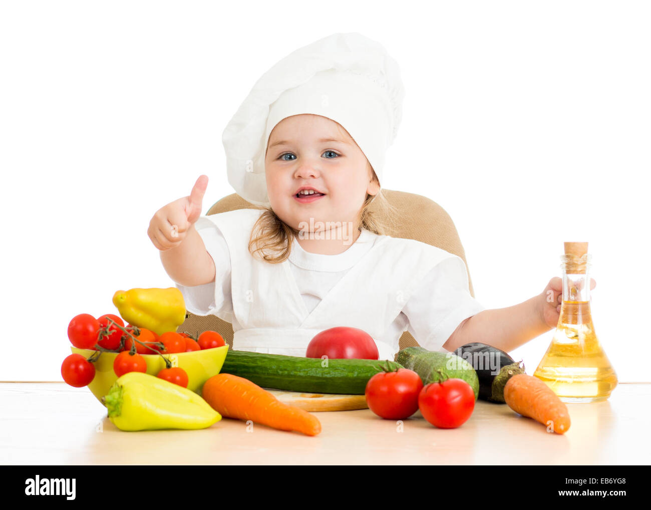 beautiful little girl with food vegetables Stock Photo - Alamy