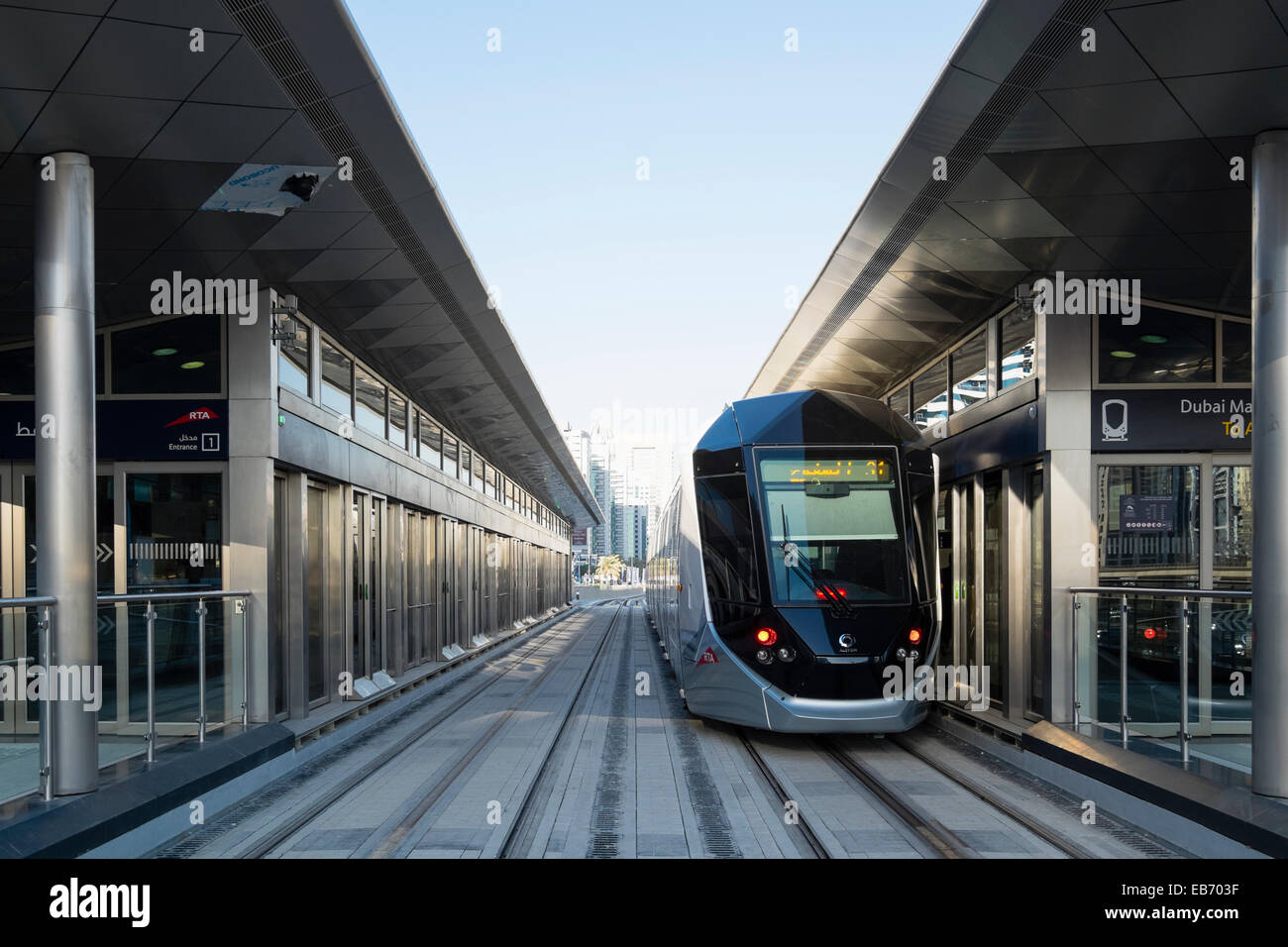 Station and tram on new Dubai Tram system in Marina district of Dubai ...
