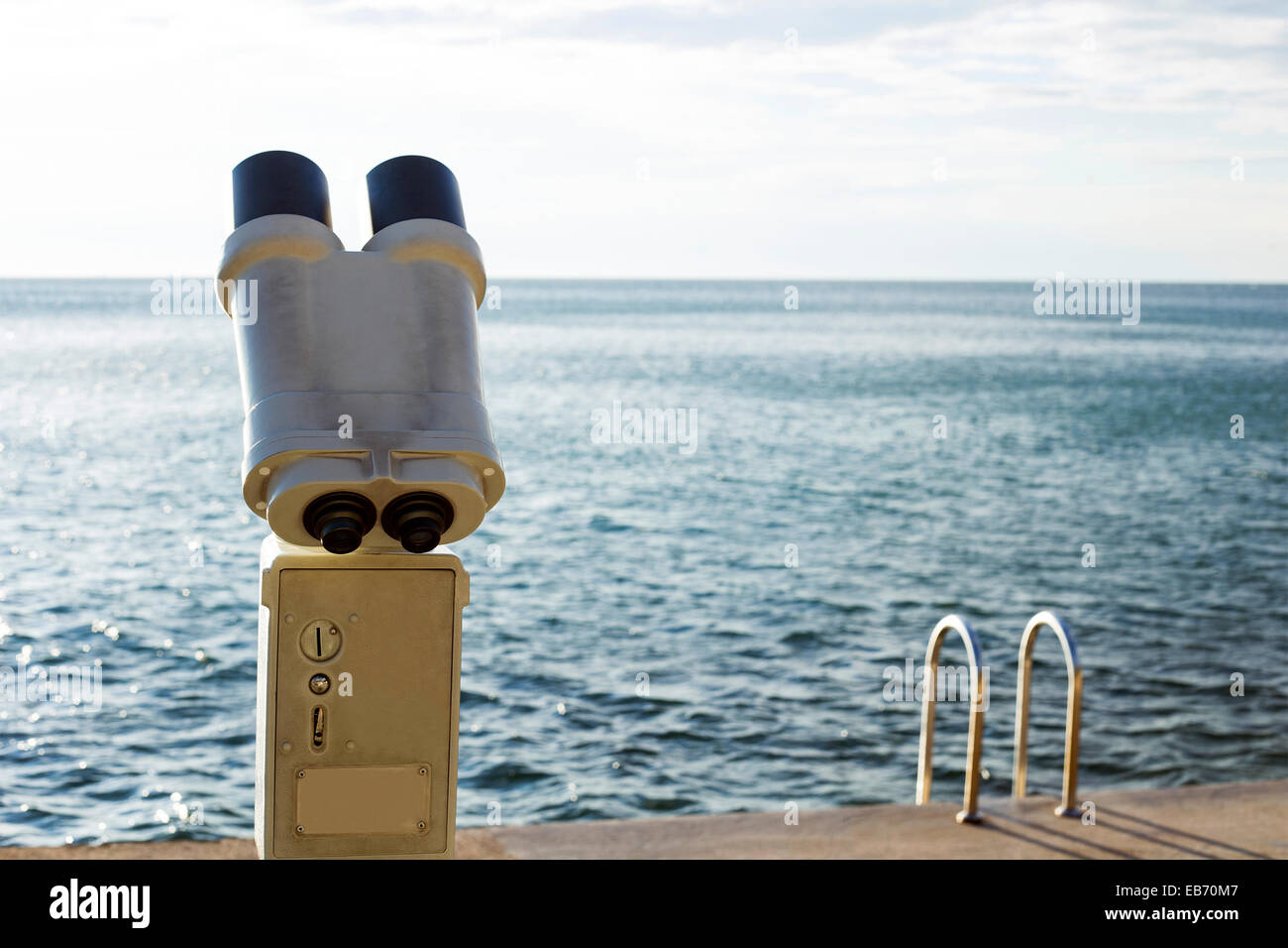 A telescope is ready for use, to observe the ocean Stock Photo - Alamy