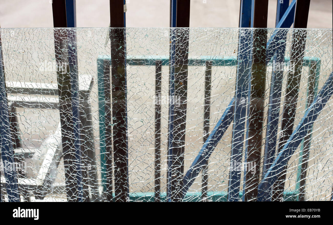 Broken safety glass on a metal frame Stock Photo - Alamy