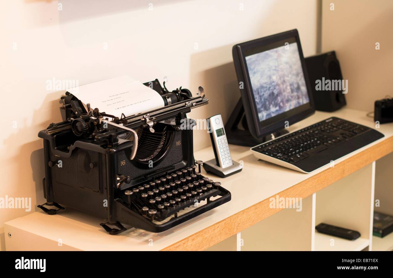 Computer with an old typewriter Stock Photo - Alamy