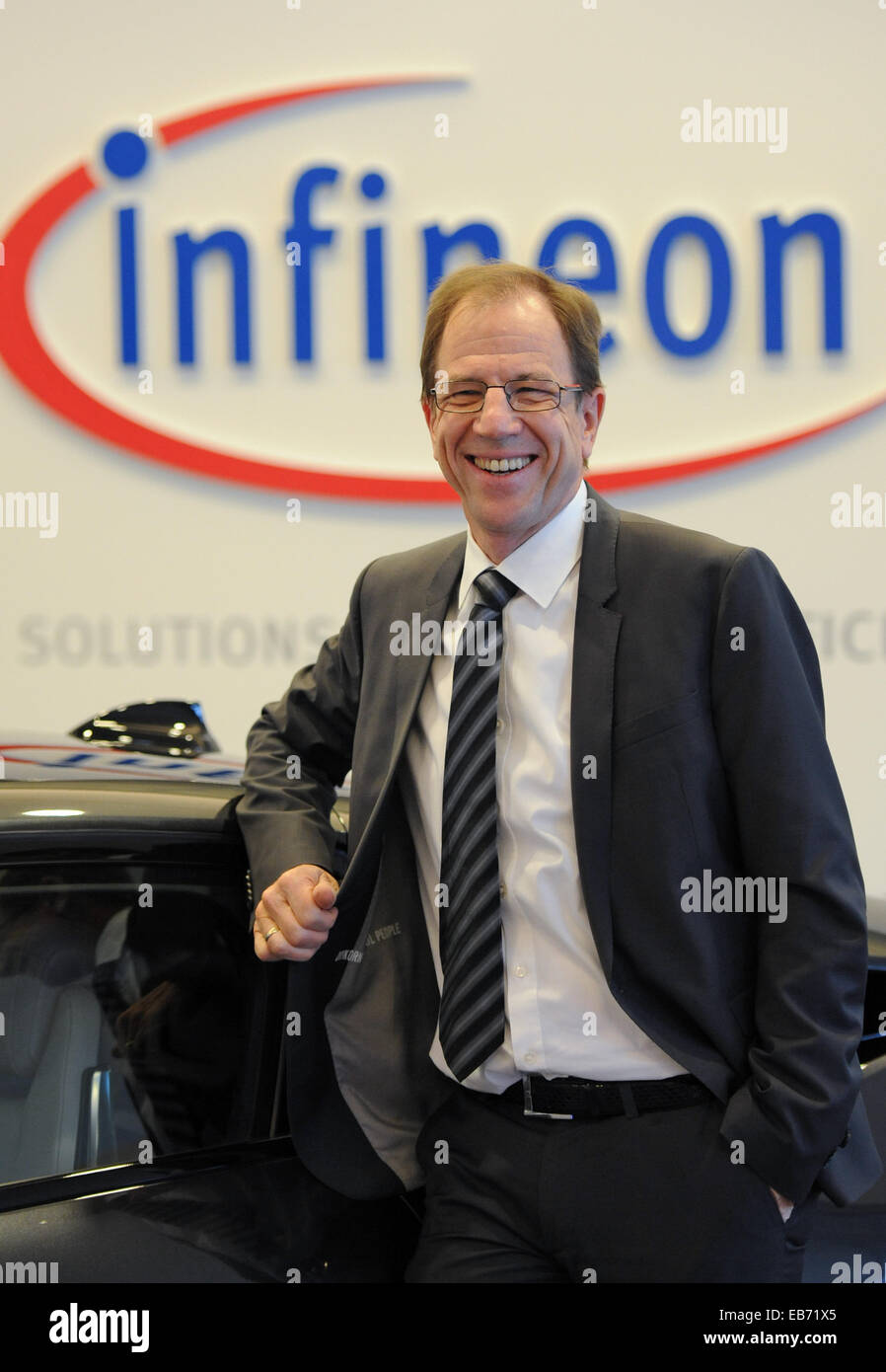 Munich, Germany. 27th Nov, 2014. Infineon CEO Reinhard Ploss stands in ...