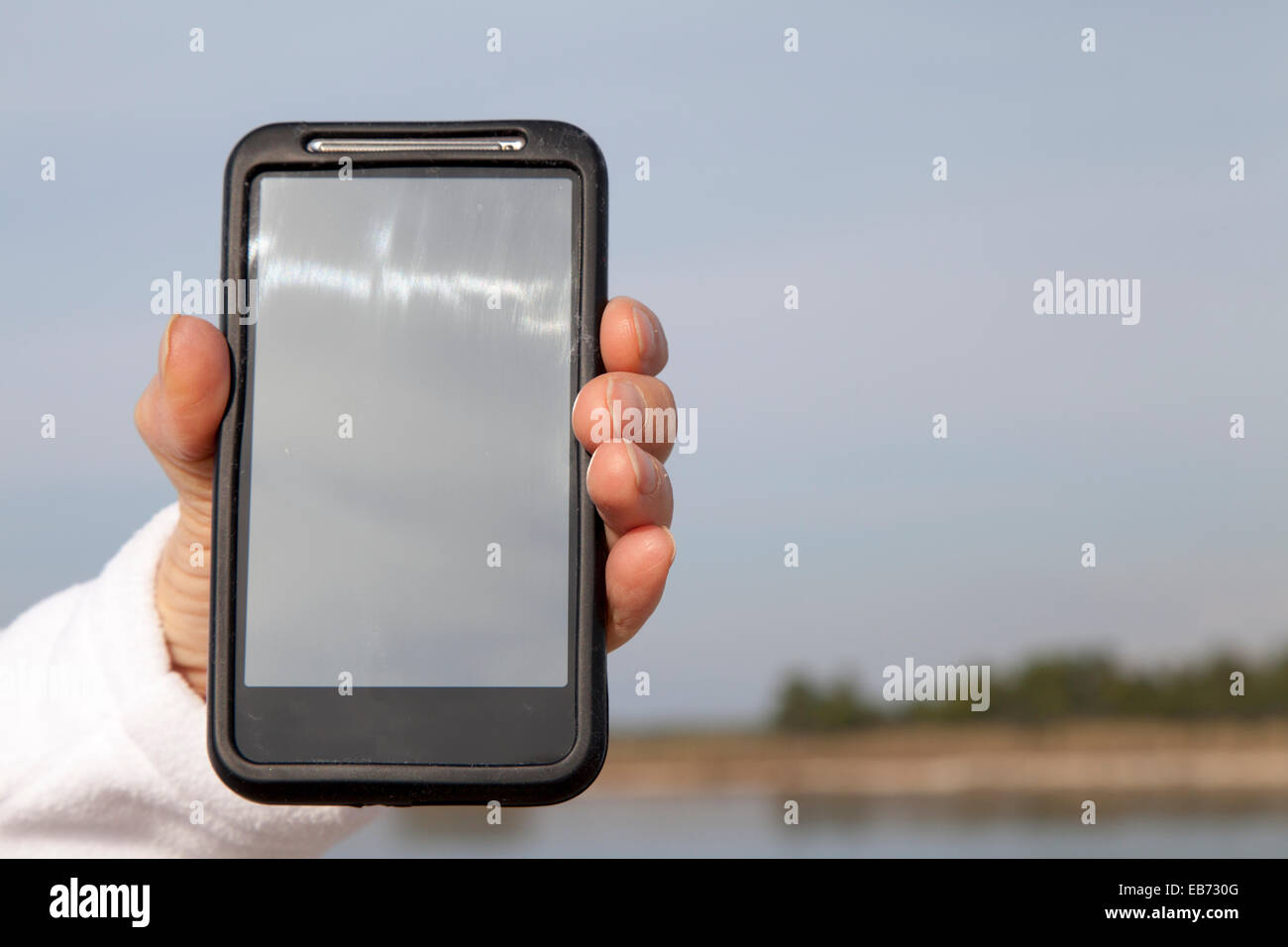 Hand showing smart mobile phone with blank screen Stock Photo - Alamy