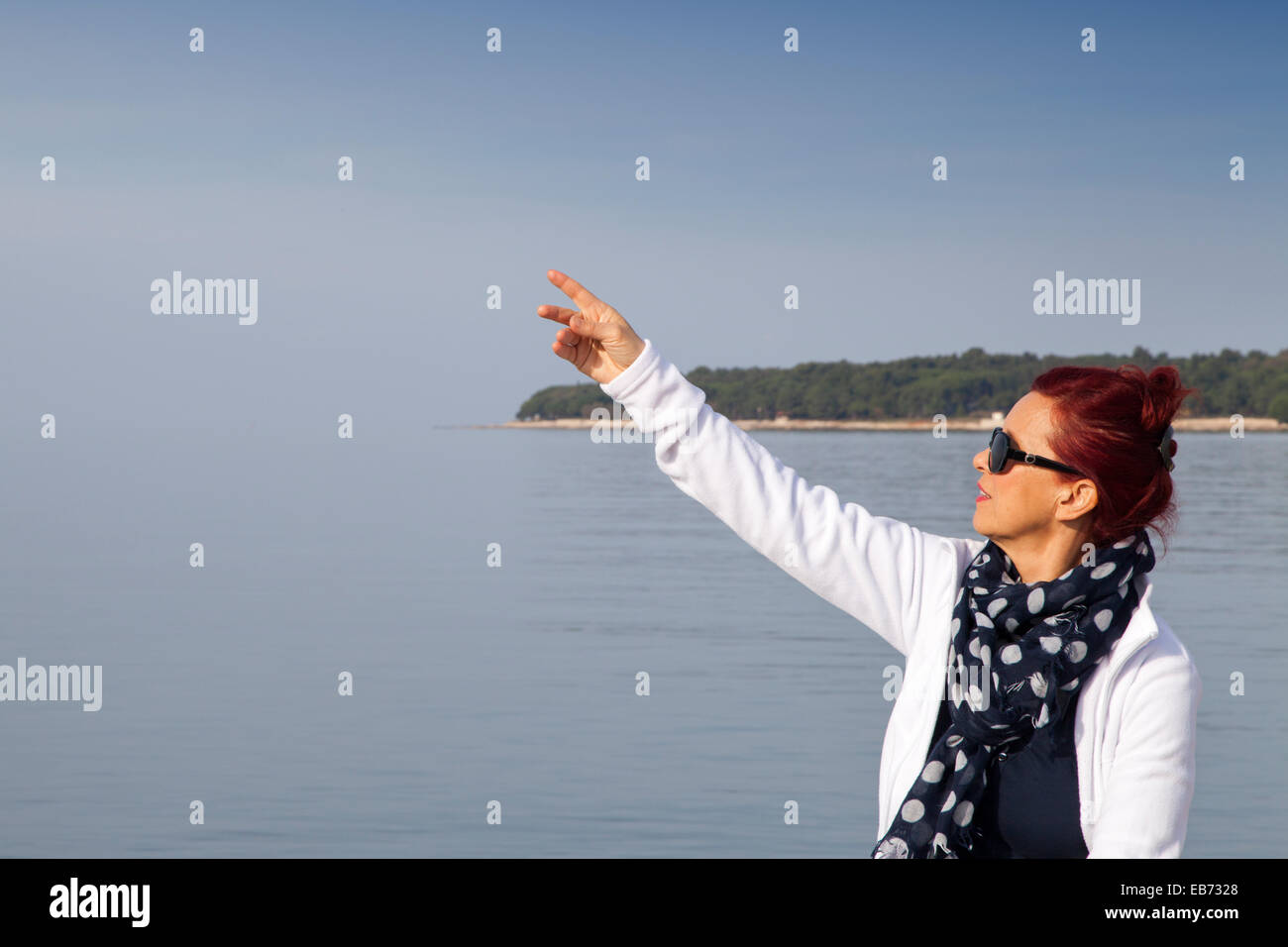 Woman pointing at text hi-res stock photography and images - Alamy