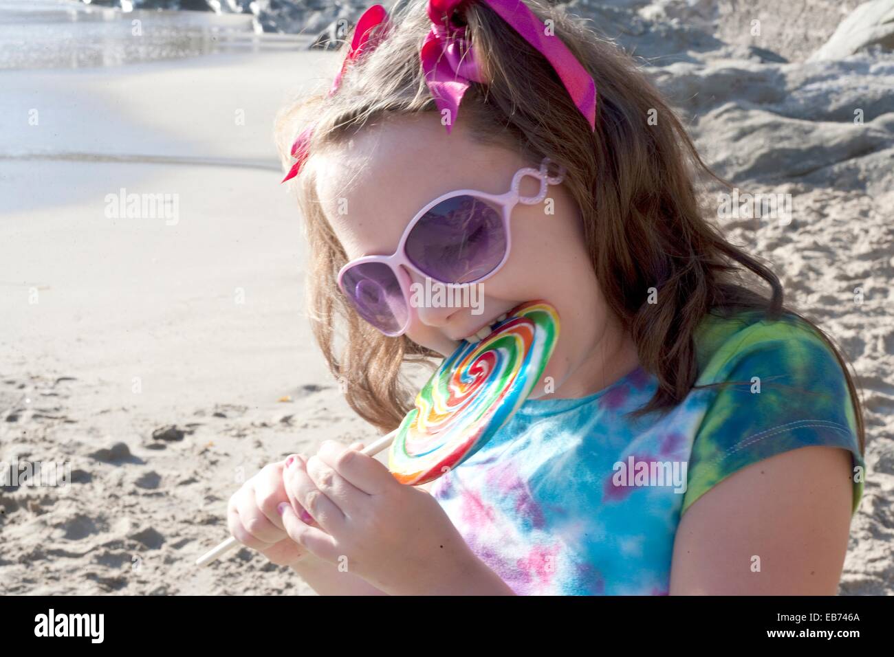 One child eating a sucker hi-res stock photography and images - Alamy