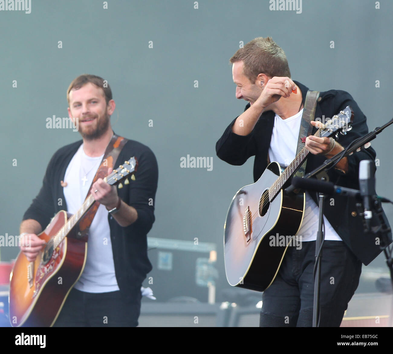 Chris Martin of Coldplay joins Kings Of Leon on stage during their set ...
