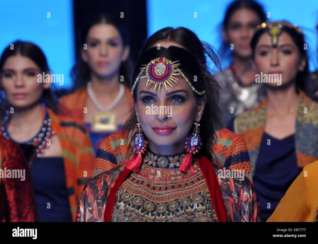 Karachi, Pakistan. 26th Nov, 2014. Models present creations by fashion ...