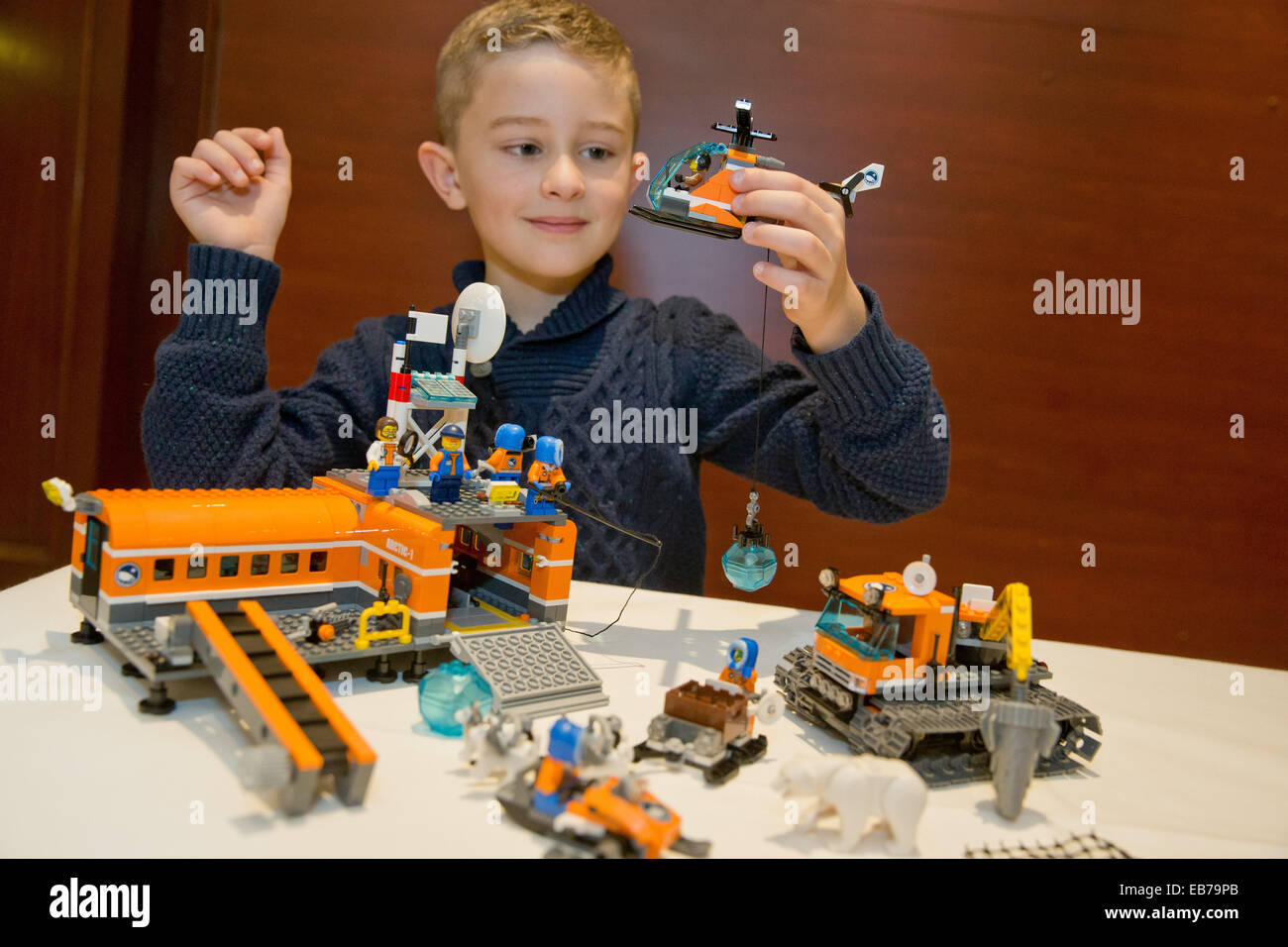 Nuremberg, Germany. 27th Nov, 2014. Fynn plays with the Lego City ...