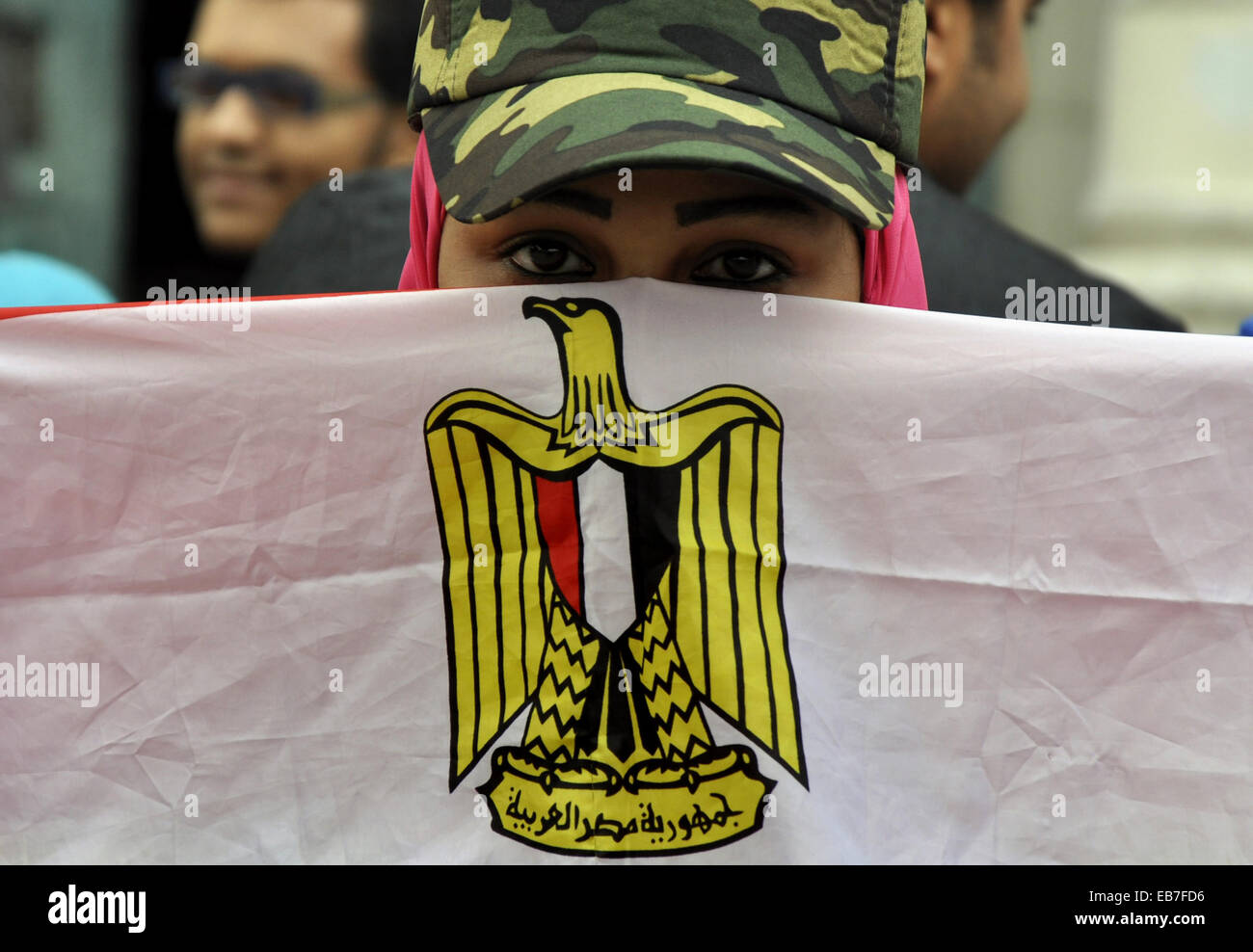 Cairo, Egypt. 27th Nov, 2014. Egyptian female students hold banners ...