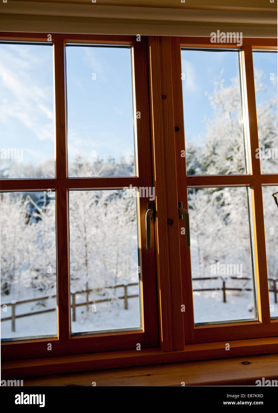 Early morning frosty winter, view through a window Stock Photo - Alamy