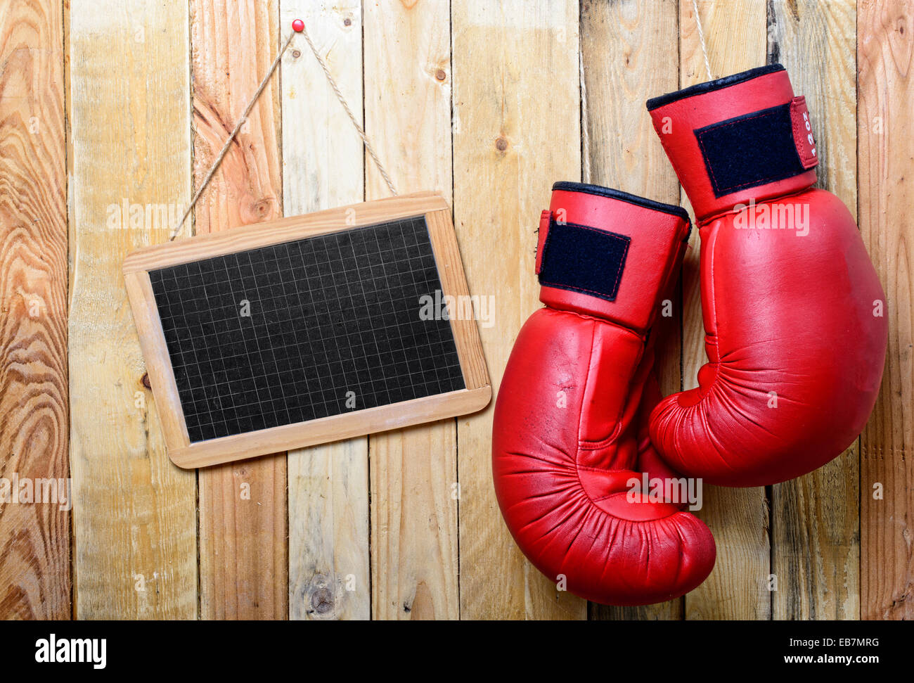 pair of red boxing gloves with a chalkboard Stock Photo - Alamy