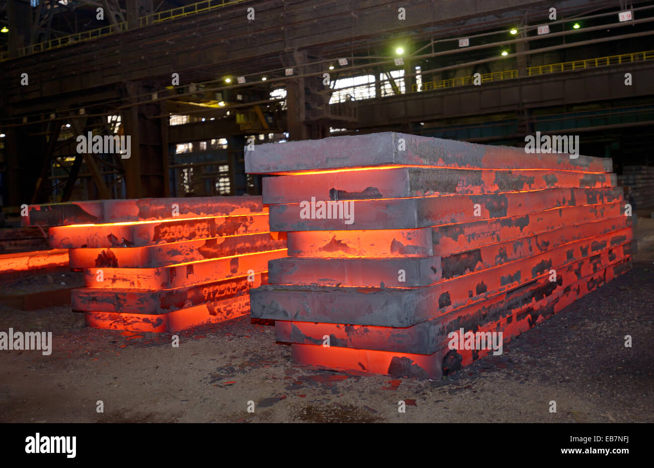 stack of hot thick steel plate in plant Stock Photo - Alamy