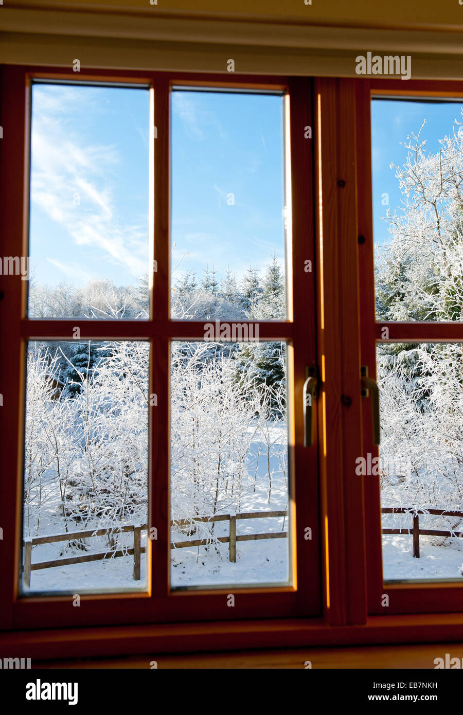 Early morning frosty winter, view through a window Stock Photo - Alamy