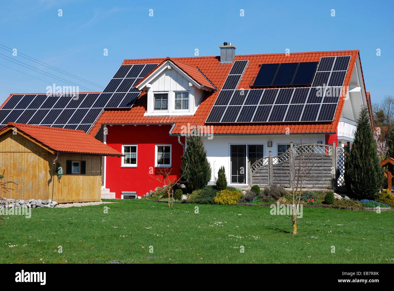 House with solar roof Stock Photo - Alamy