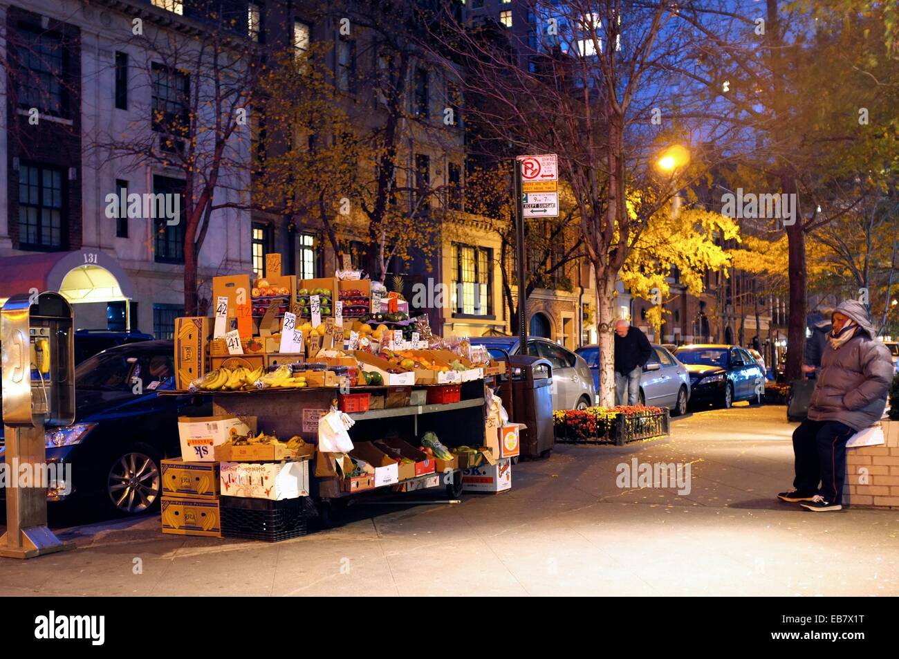 Outdoor Fruit Vendor and Stand on a Cold Winter Night Stock Photo - Alamy