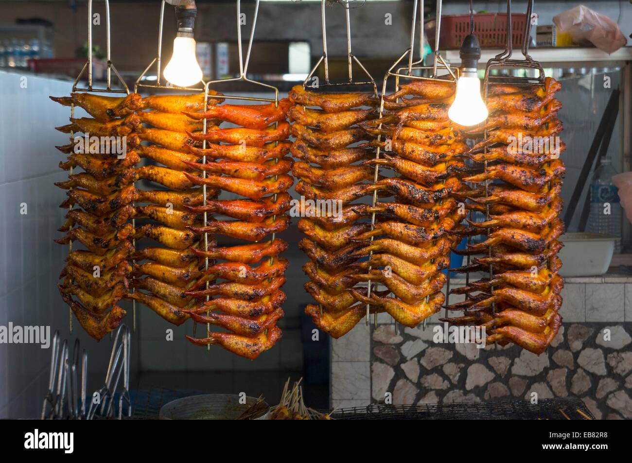 Selling cooked chicken wings hi-res stock photography and images - Alamy