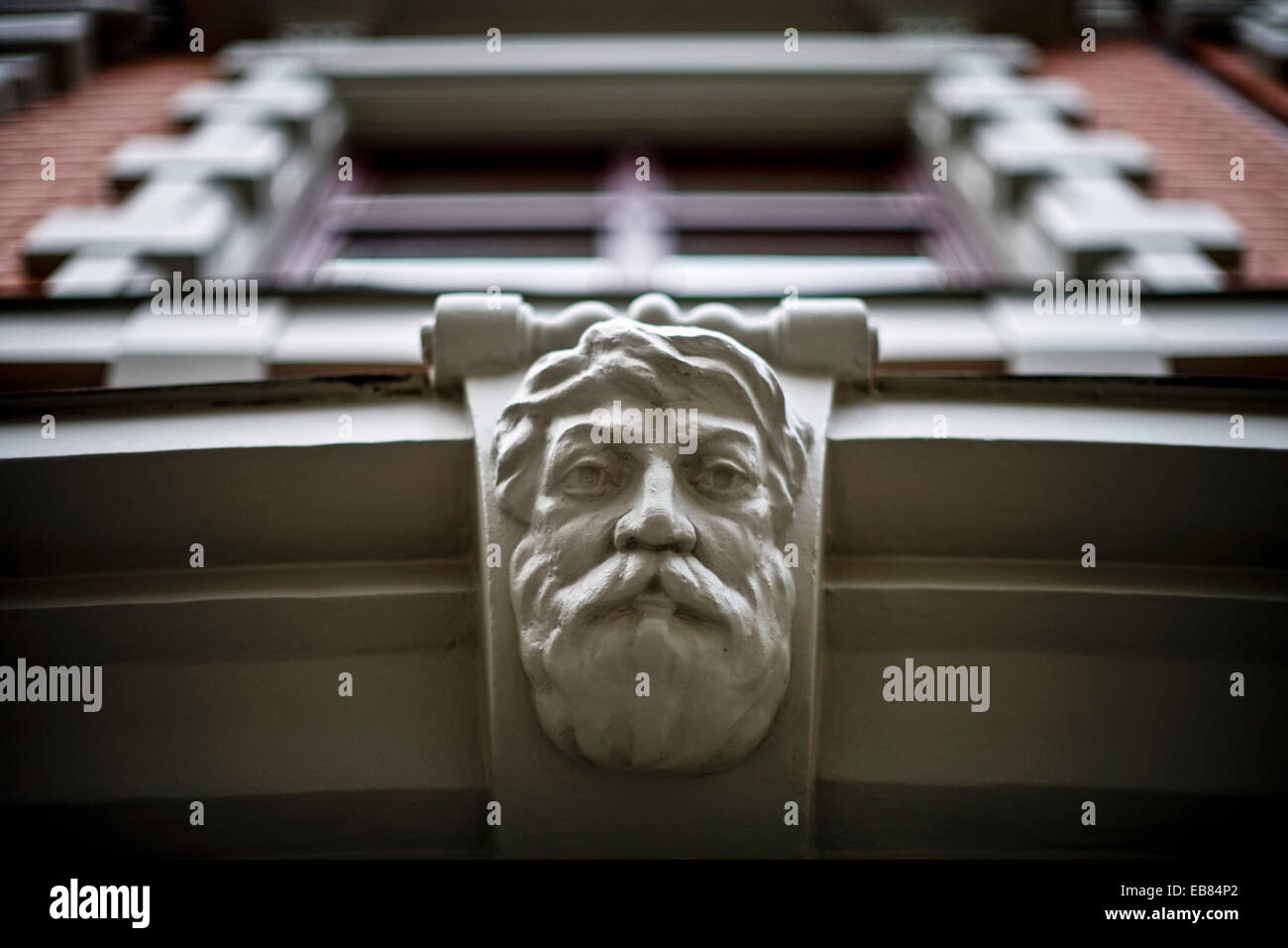 Face of the men. Sculpture on the house fasade Stock Photo - Alamy