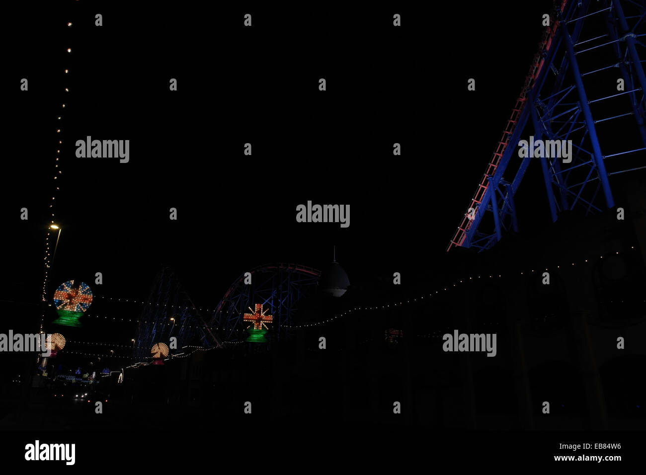 Night view, blue illuminated 'Big One Rollercoaster', circular Union ...