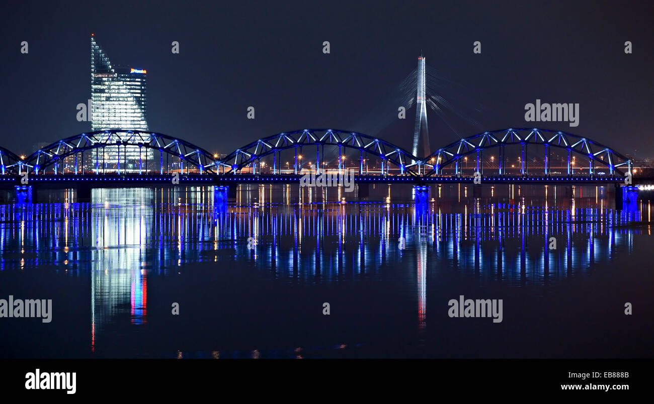 Old Riga, evening, night. Stone bridge, reflection. River Daugava ...