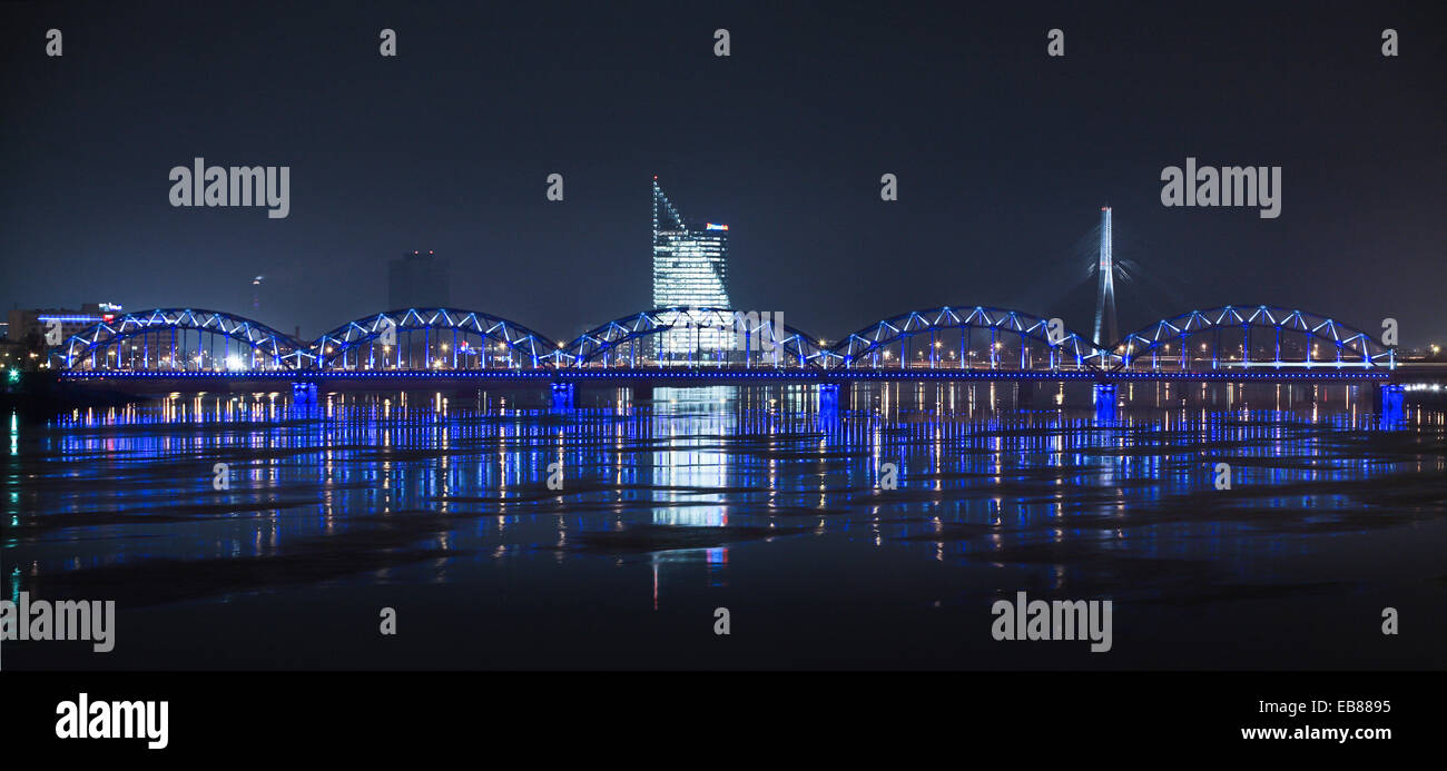 Old Riga, evening, night. Stone bridge, reflection. River Daugava ...