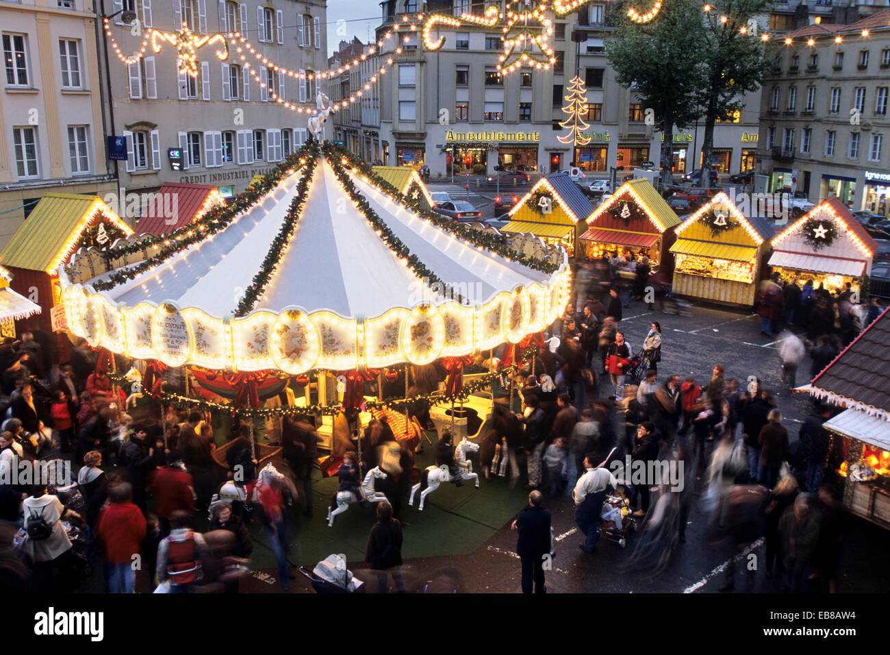 merry-go-round and Christmas market on Saint-Louis square Saint ...