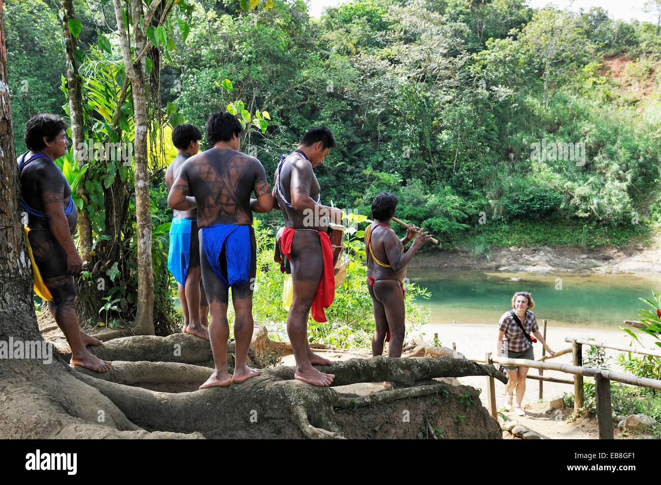welcoming by villagers of Embera native community living by the Chagres ...