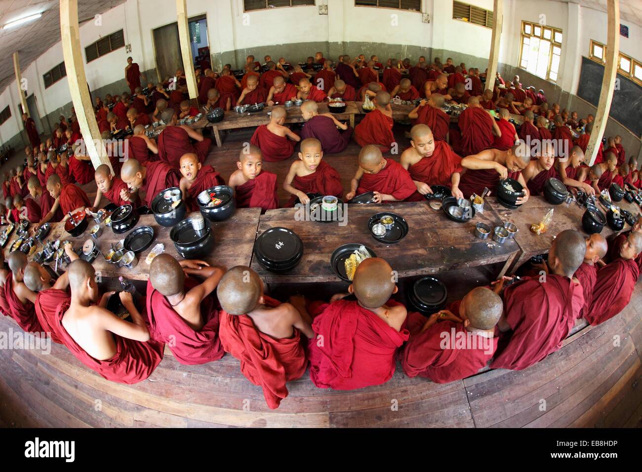 Novice monk eating hi-res stock photography and images - Alamy