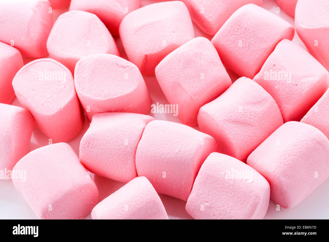 Round large pink marshmallows on a white backgrouns Stock Photo - Alamy