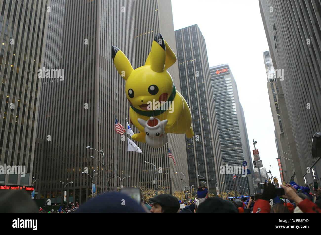 New York, USA. 27th Nov, 2014. The Pikachu balloon passes by during the ...