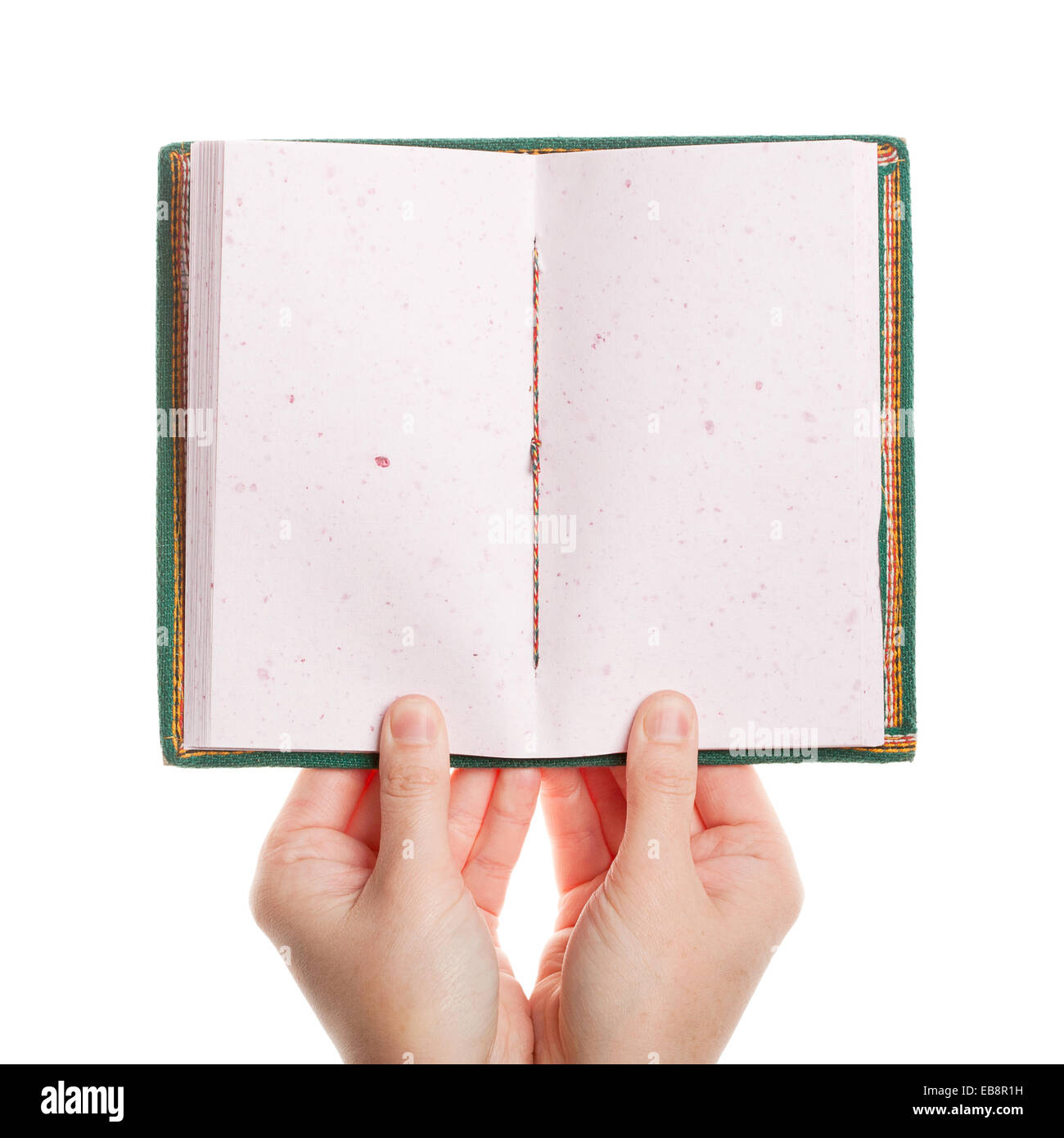 Opened book in hands isolated on white background Stock Photo - Alamy