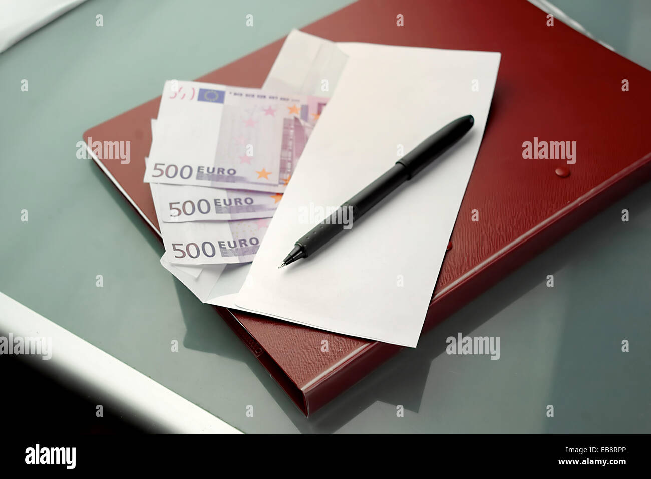 Money in an envelope Stock Photo - Alamy