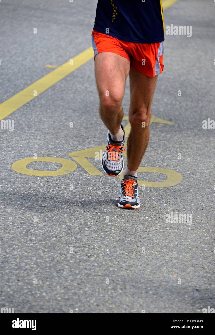 Marathon runner, street of Geneva, Switzerland Stock Photo - Alamy