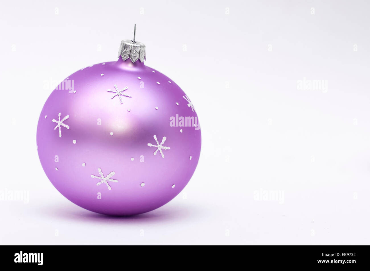 Christmas violet ball isolated on white background Stock Photo - Alamy