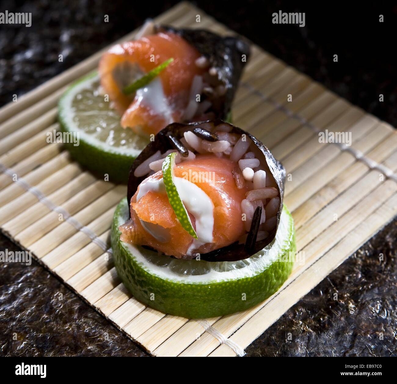 Catering recipe: Salmon, white cheese, rice and seaweed cone on lime ...