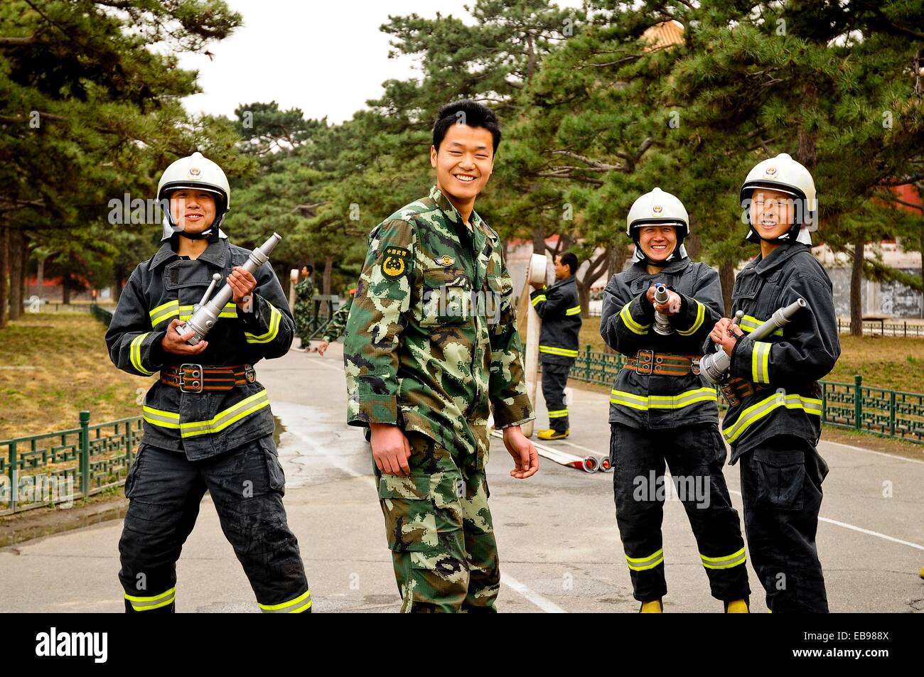 Firefighters protective clothing hi-res stock photography and images ...