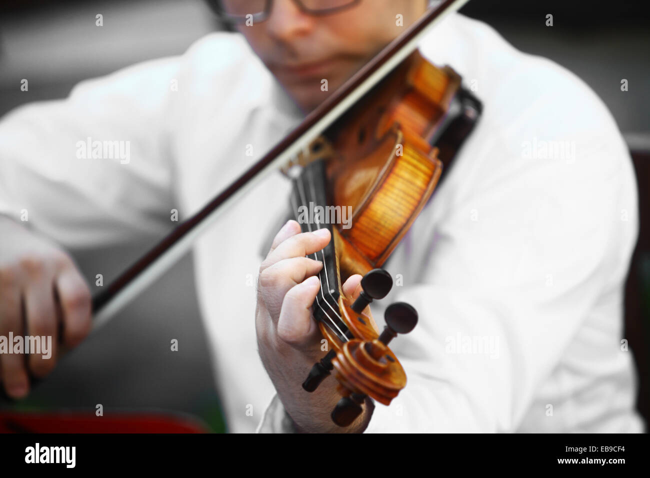 Detail of violin being played by a musician Stock Photo - Alamy
