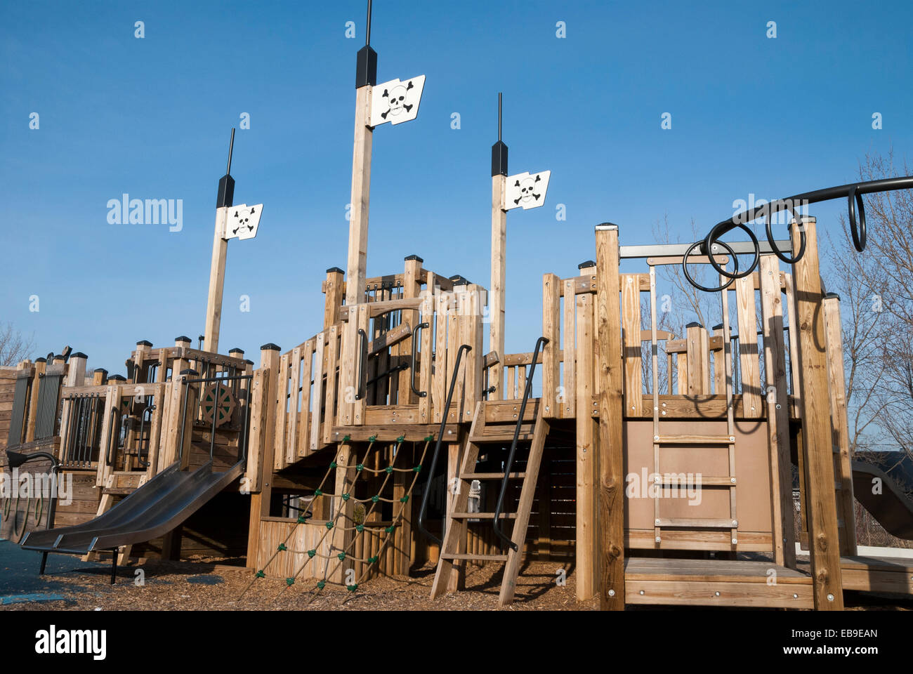 A children's jungle gym in the shape of the deck of a pirate ship Stock ...