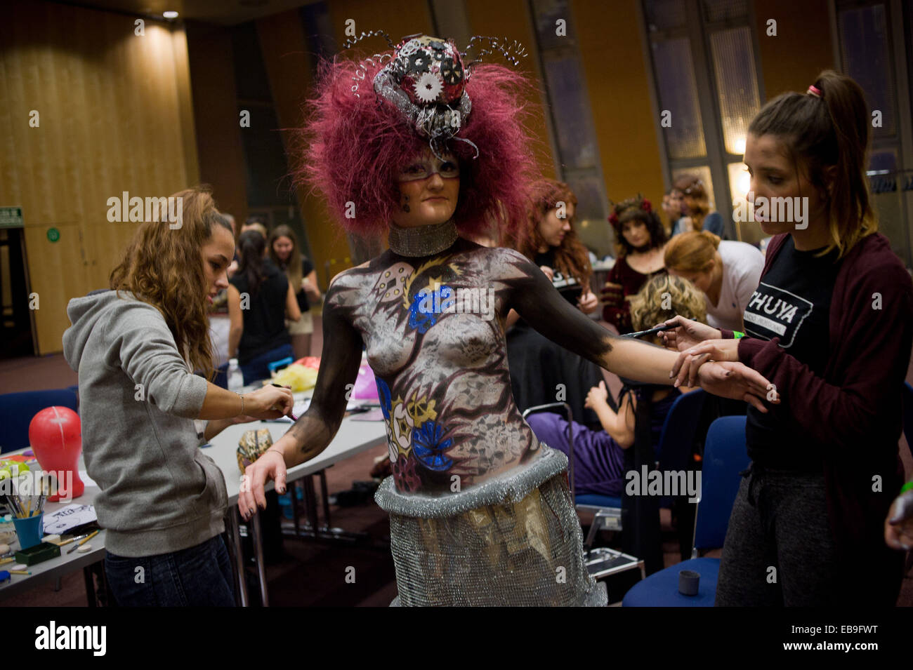 Barcelona, Spain. 27th Nov, 2014. A woman decorated with body paint is ...