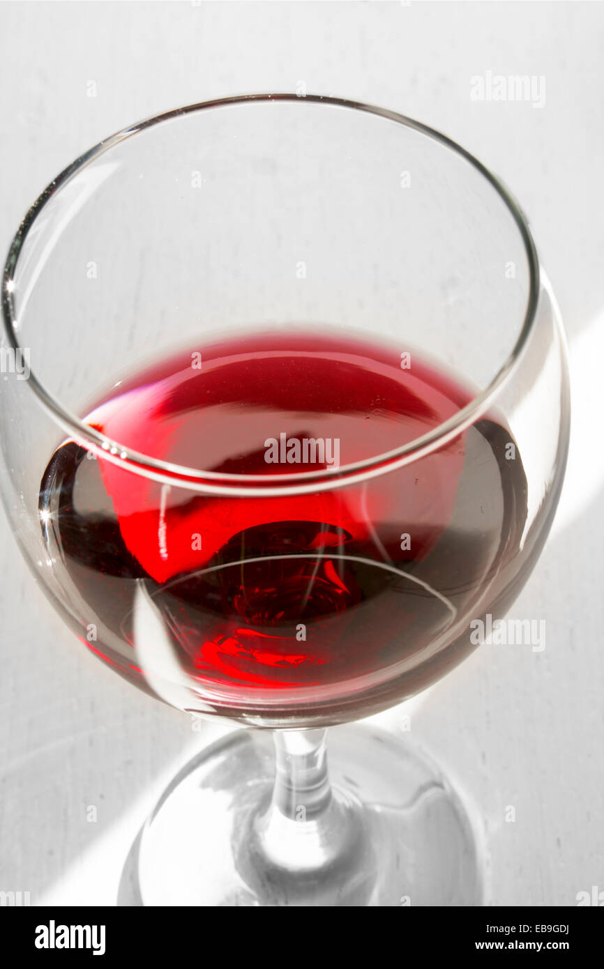 glass of red wine, liquid detail on white background Stock Photo - Alamy