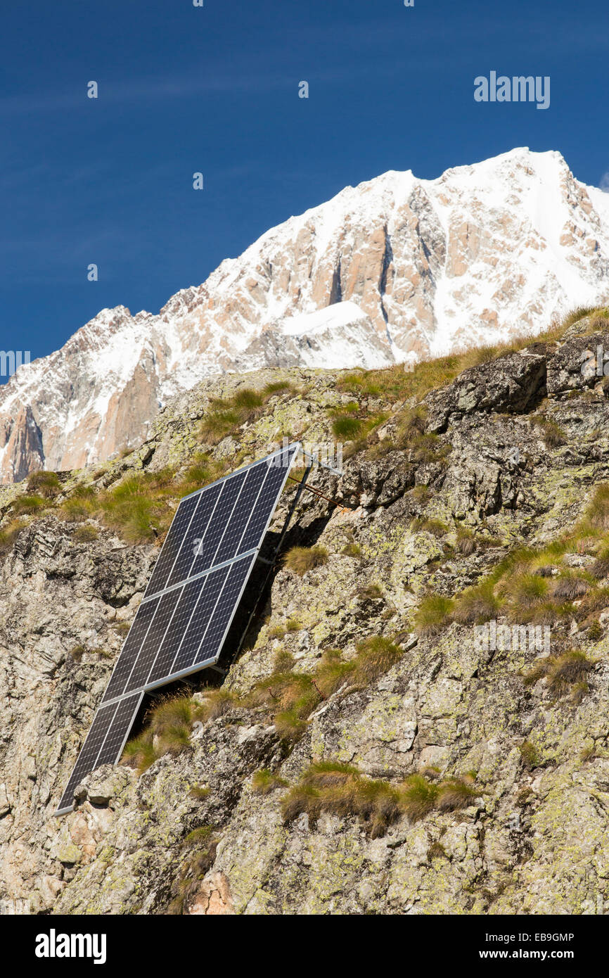 Solar panels attached to a cliff above the Refuge Bertone, which ...