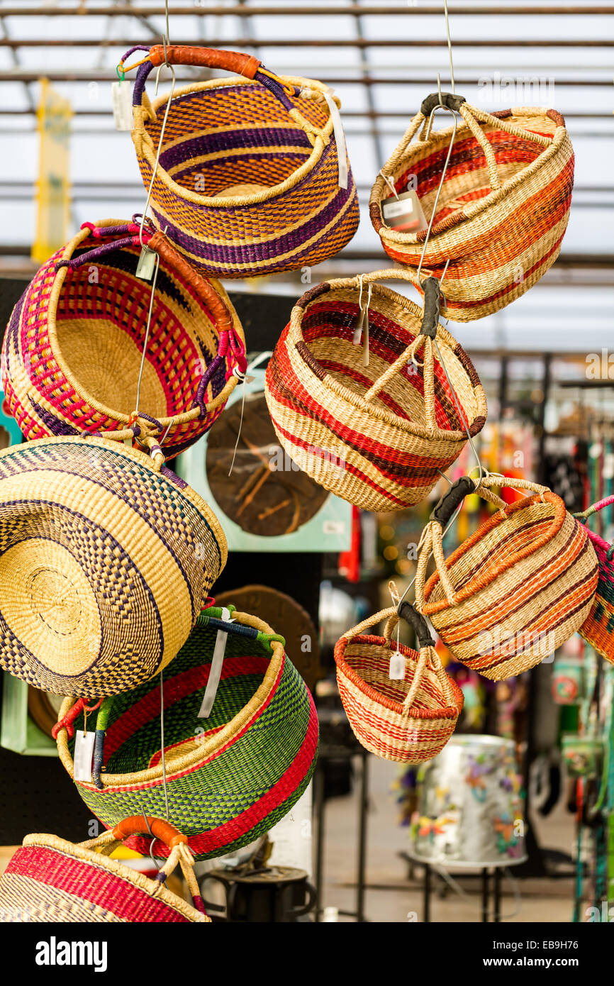 Handmade colorful baskets hanged for display Stock Photo - Alamy