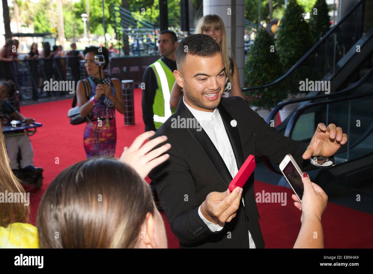 Sydney, Australia. 26 November 2014. Guy Sebastian takes ‘selfies’ with ...