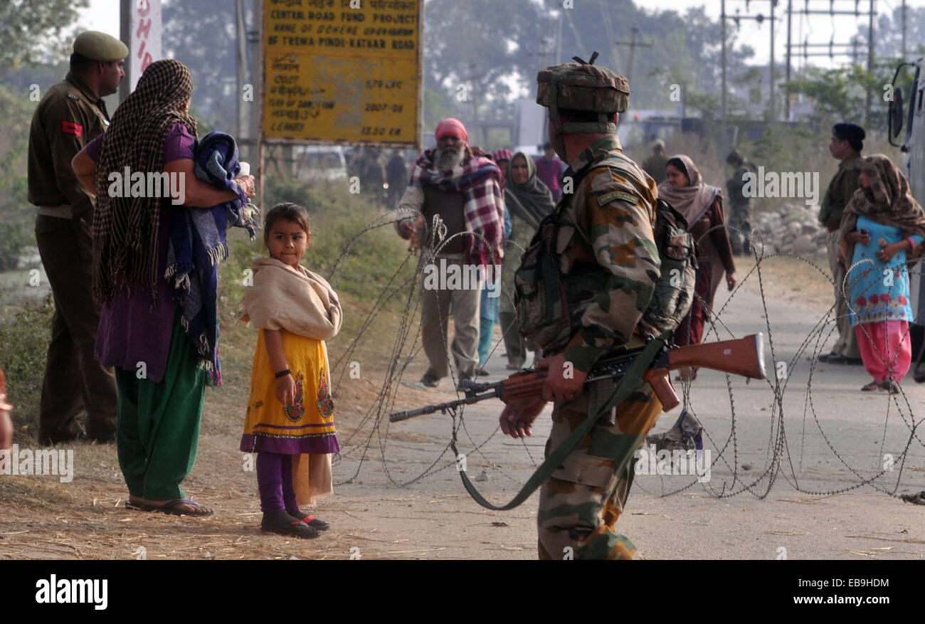 Indian villagers are seen leaving their village during the ongoing ...