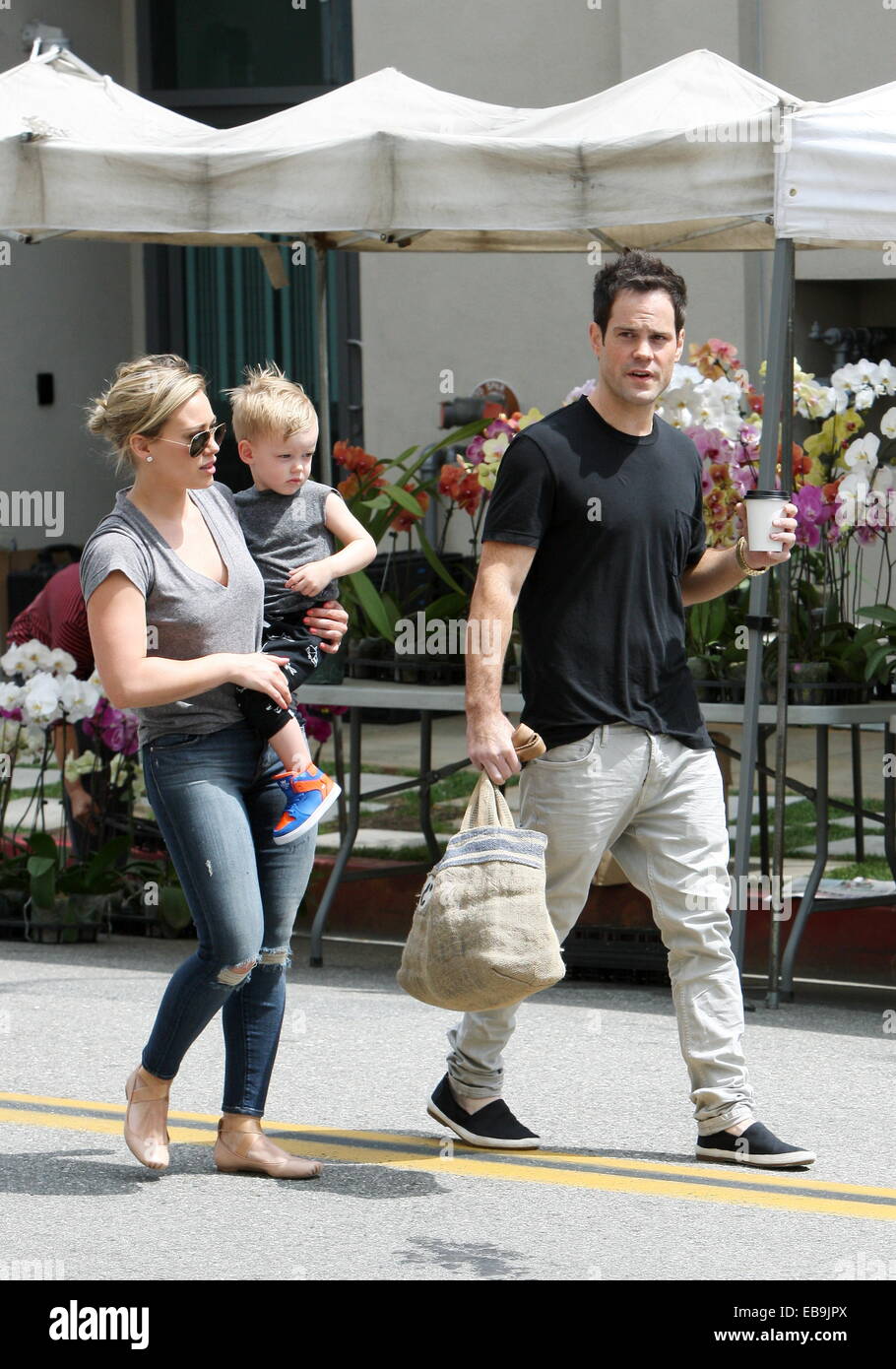Hilary Duff and Mike Comrie with baby Luca at the farmers market in ...