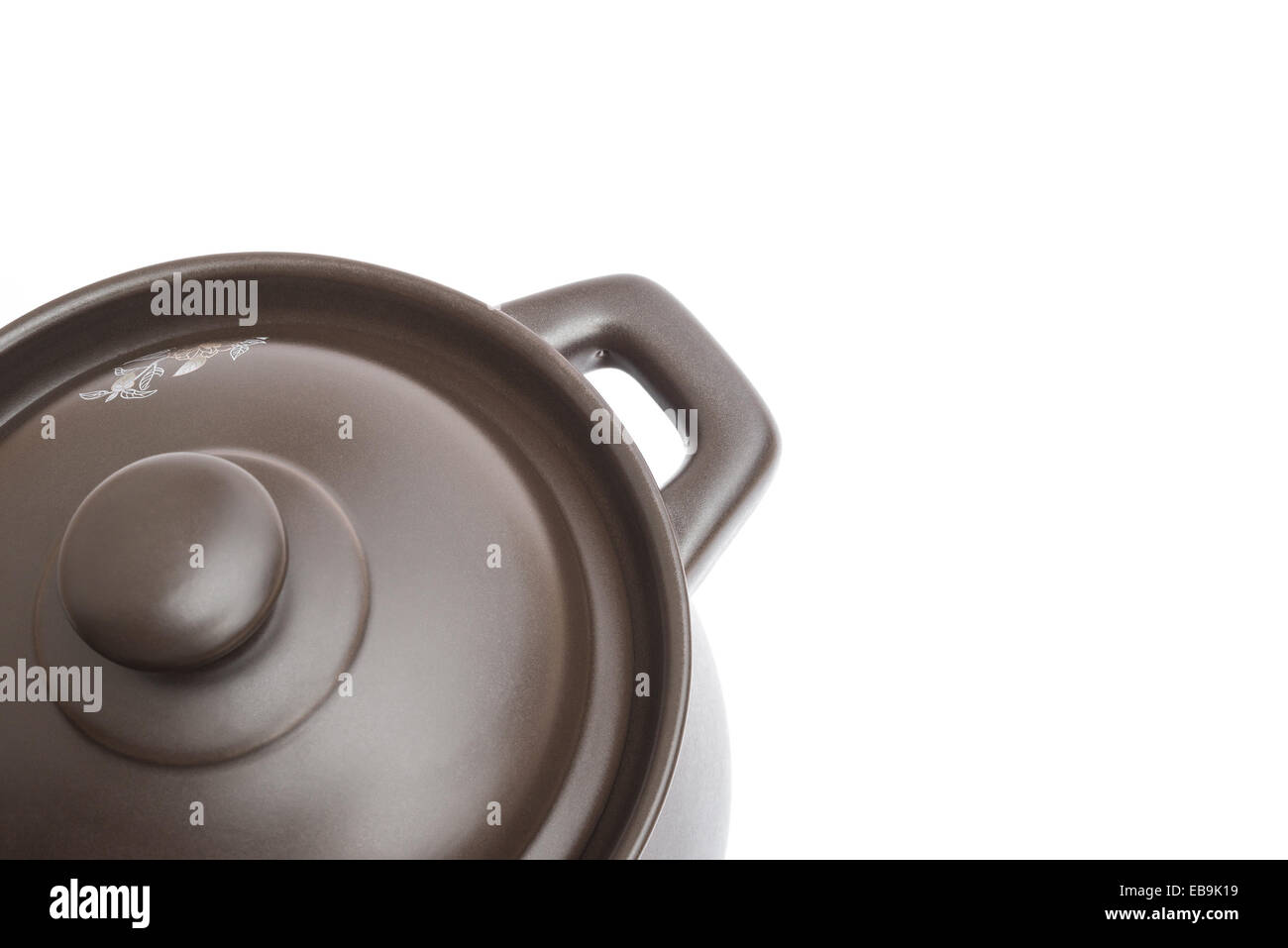 top view of a clay cooking pot on a white background Stock Photo - Alamy
