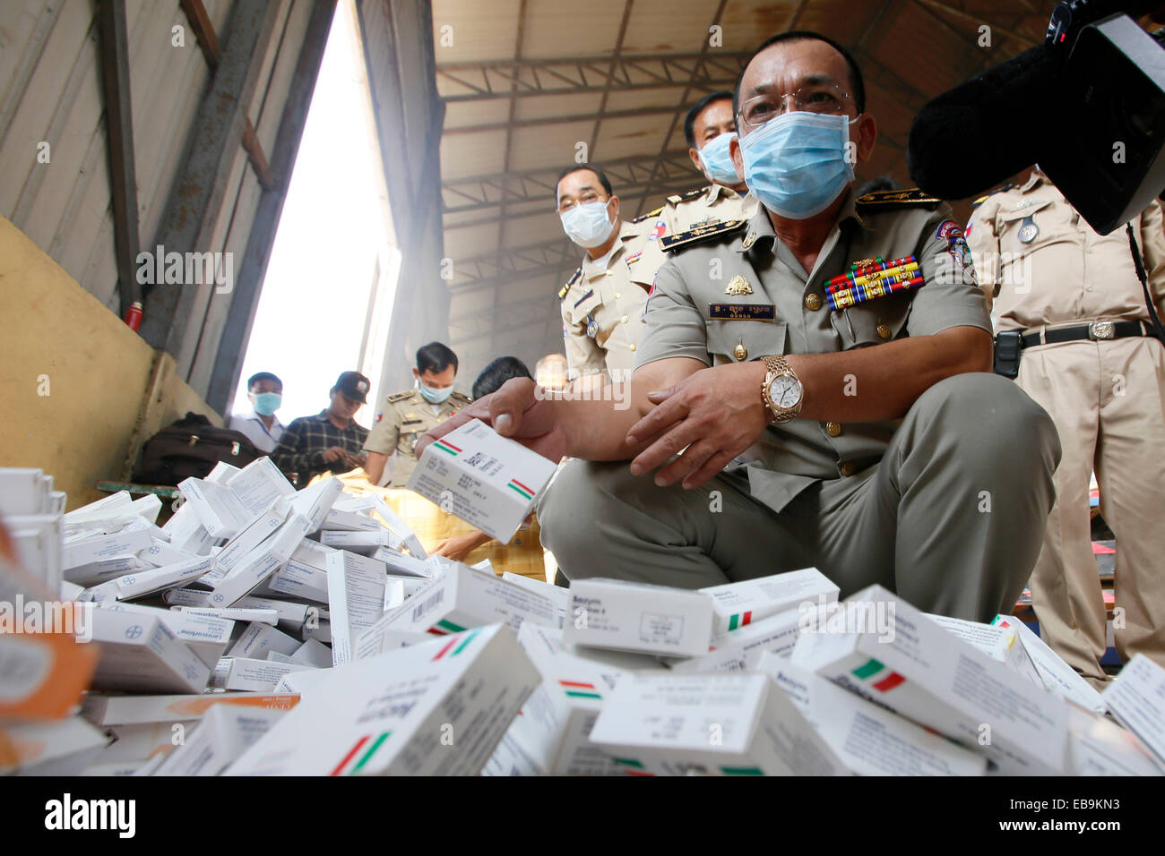 Phnom Penh, Cambodia. 28th Nov, 2014. Brigadier General Long Sreng (R, front), deputy chief of ...