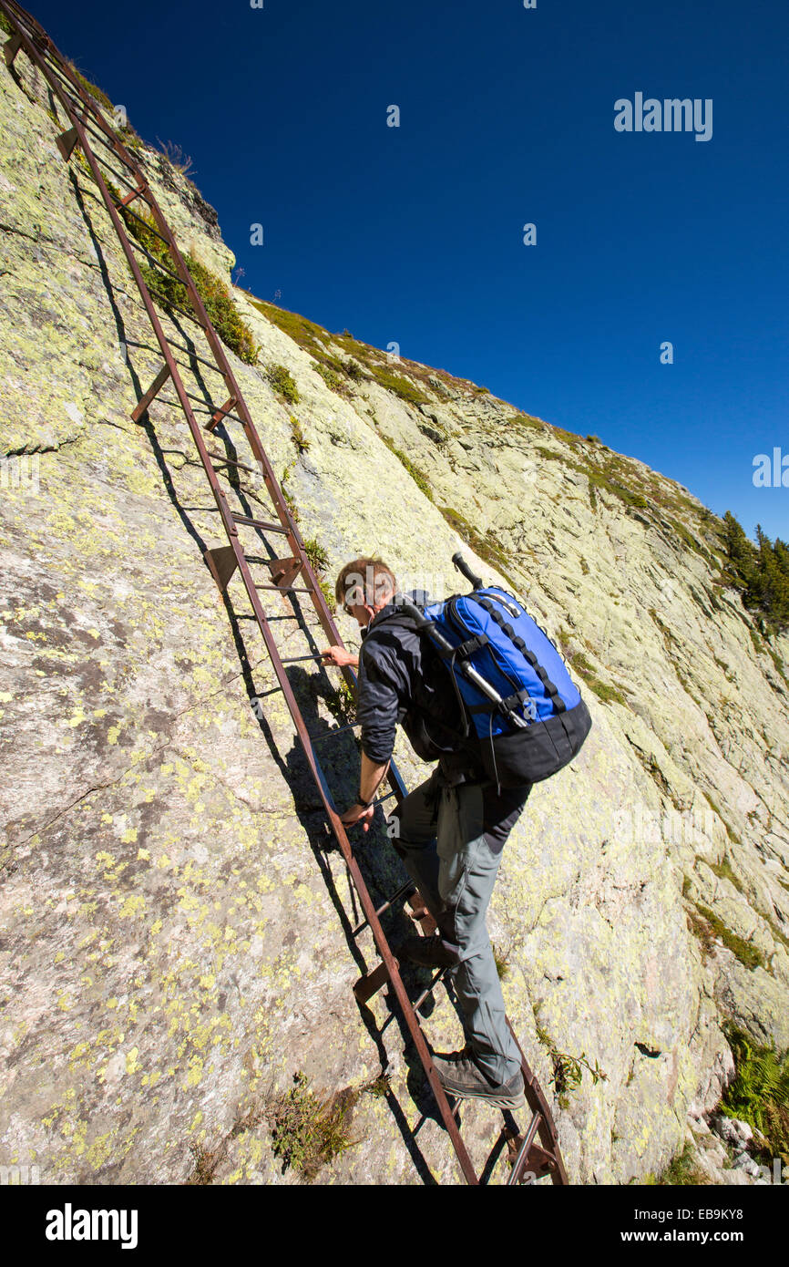 Man in climbing gear hi-res stock photography and images - Alamy