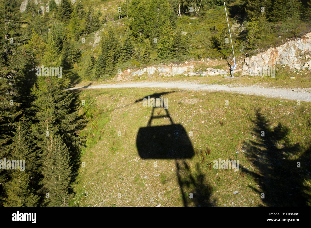 The shadow of the Flegere cable car onto the Aiguille Rouge from the ...