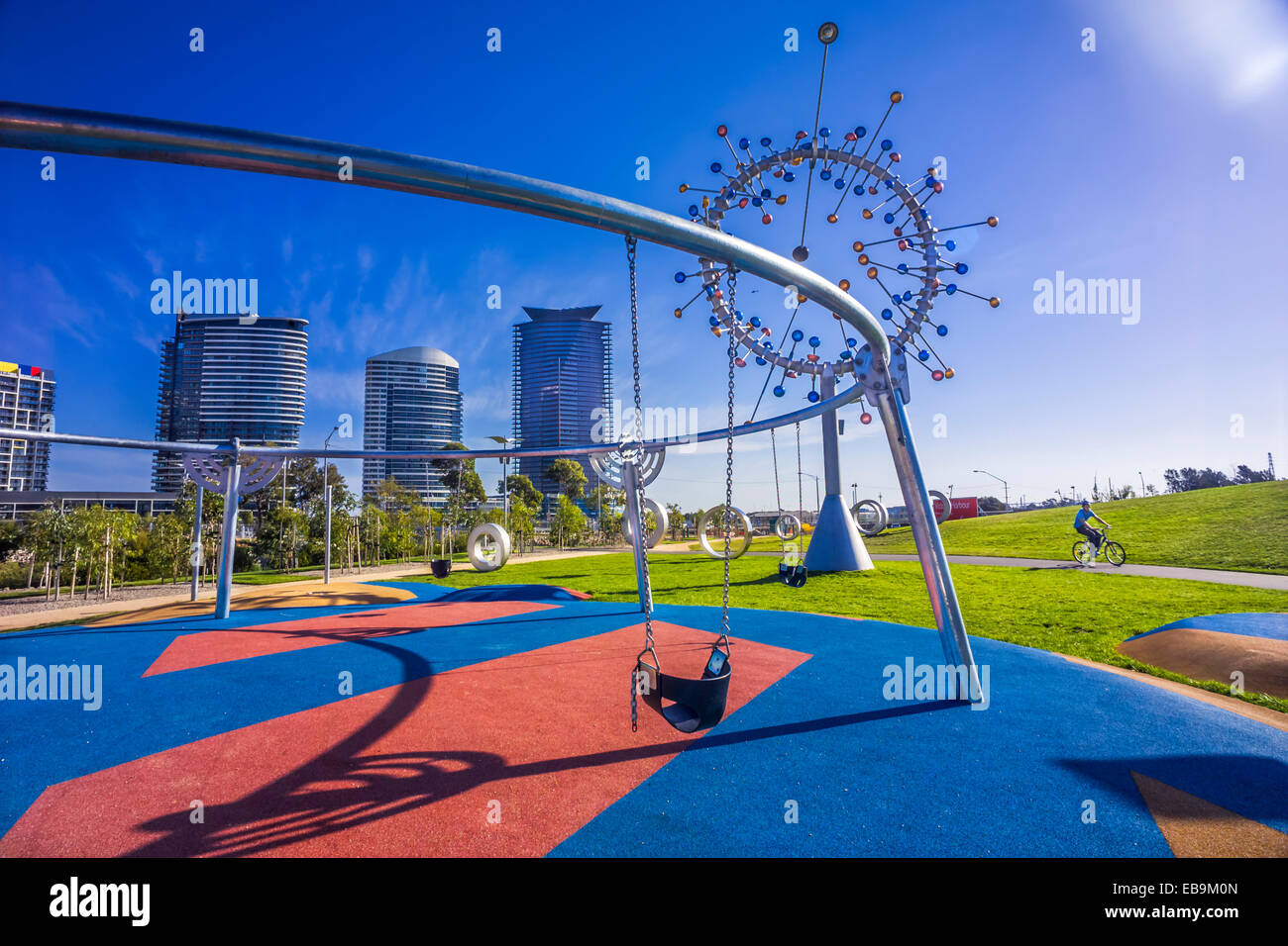 Childrens playground in Docklands Park with Blowhole kinetic sculpture ...