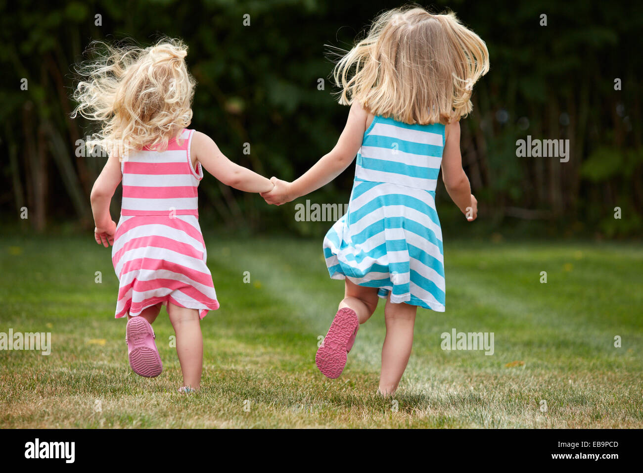 Two Little Girls Best Friends Holding Hands